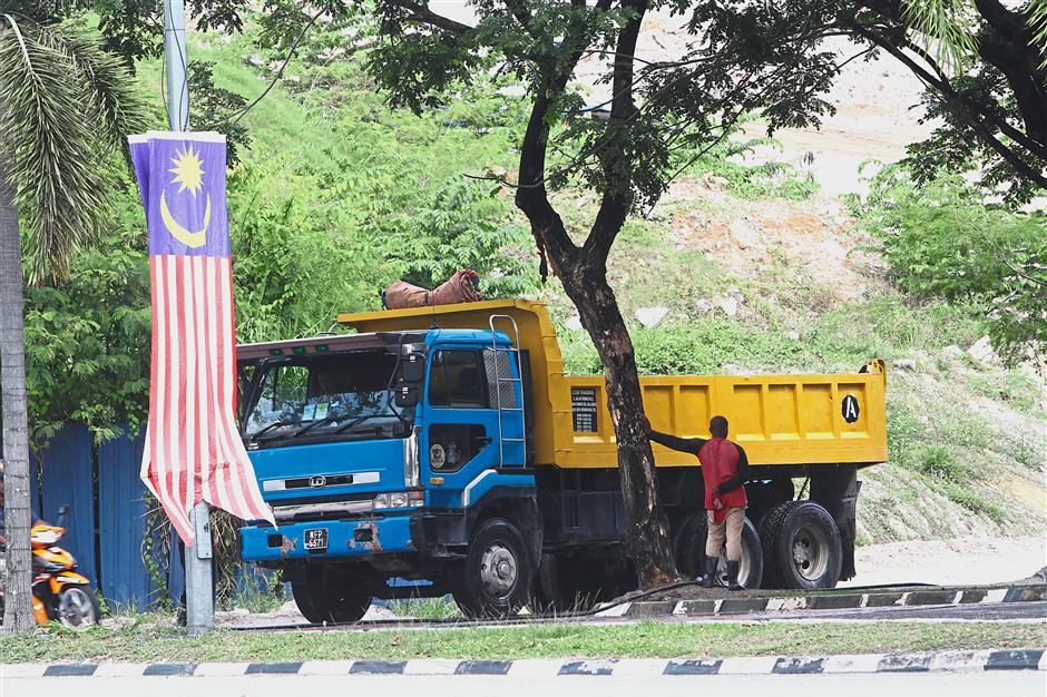Heavy lorries spotted dumping debris and transporting sand from site ...