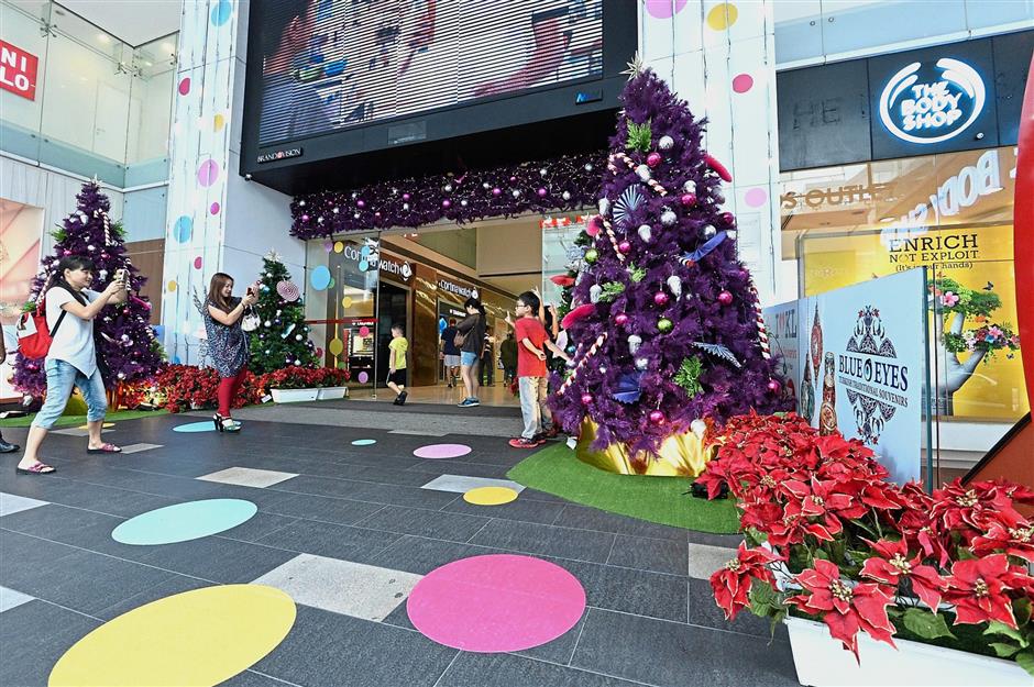 Malls all dressed up in festive colours apart from winter white | The Star