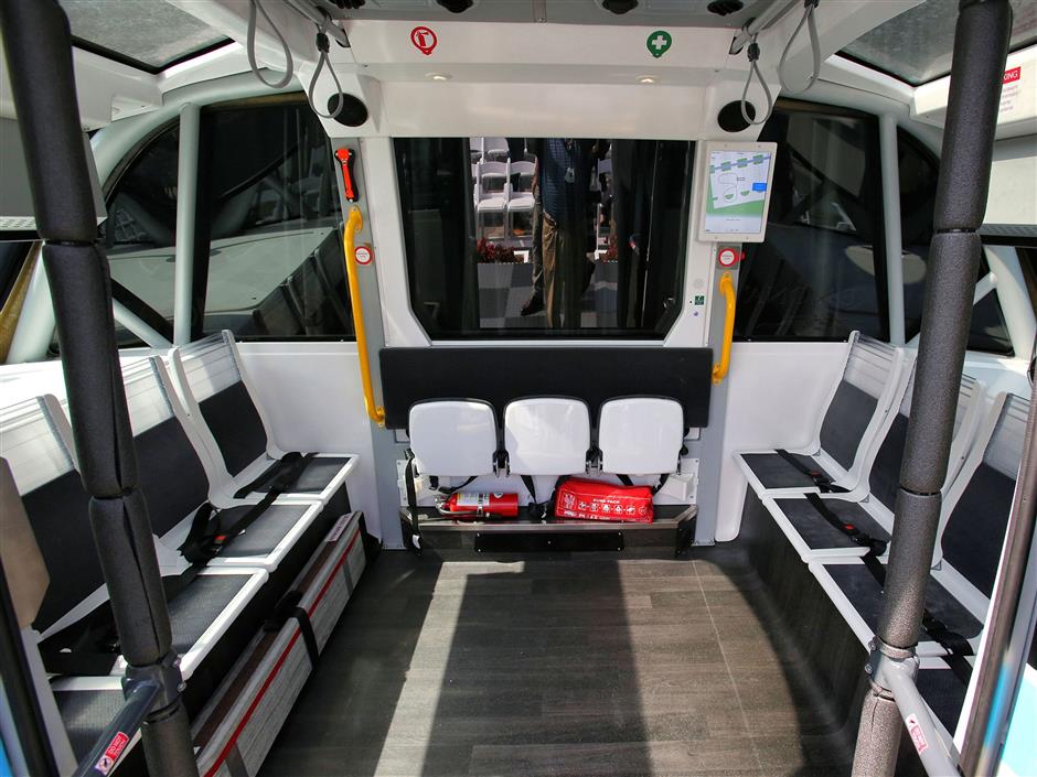 A ride on the autonomous bus: No driver, no steering wheel, no brake ...