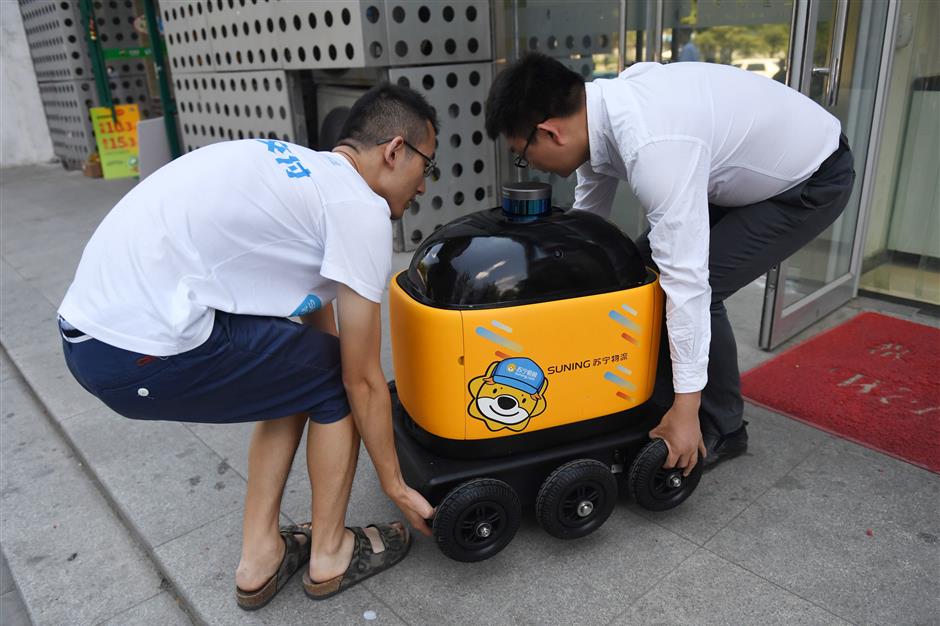 In China, yellow robots deliver snacks to your home | The Star